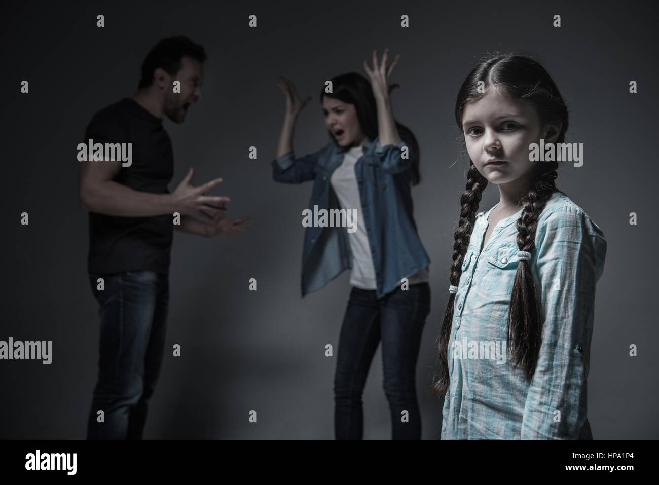Do not quarrel. Young family couple using gesticulation while sorting ...