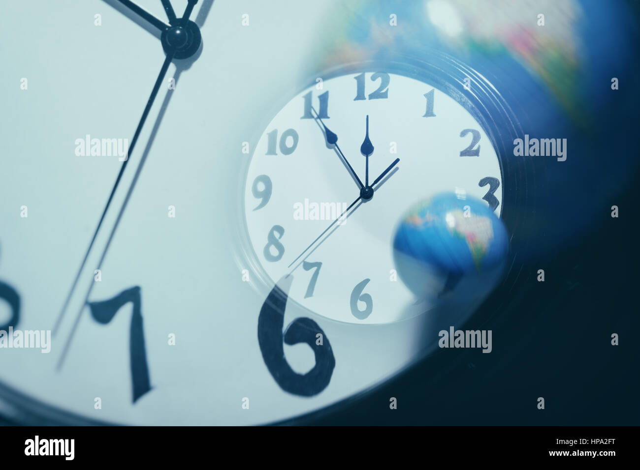 wall clock face and Globe, concept of save earth Stock Photo - Alamy