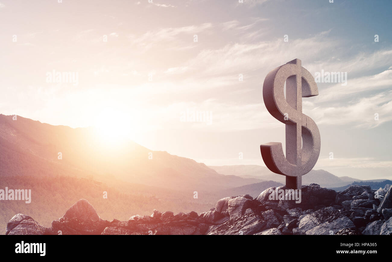 Stone dollar symbol outdoors on green hill as currency sign Stock Photo ...