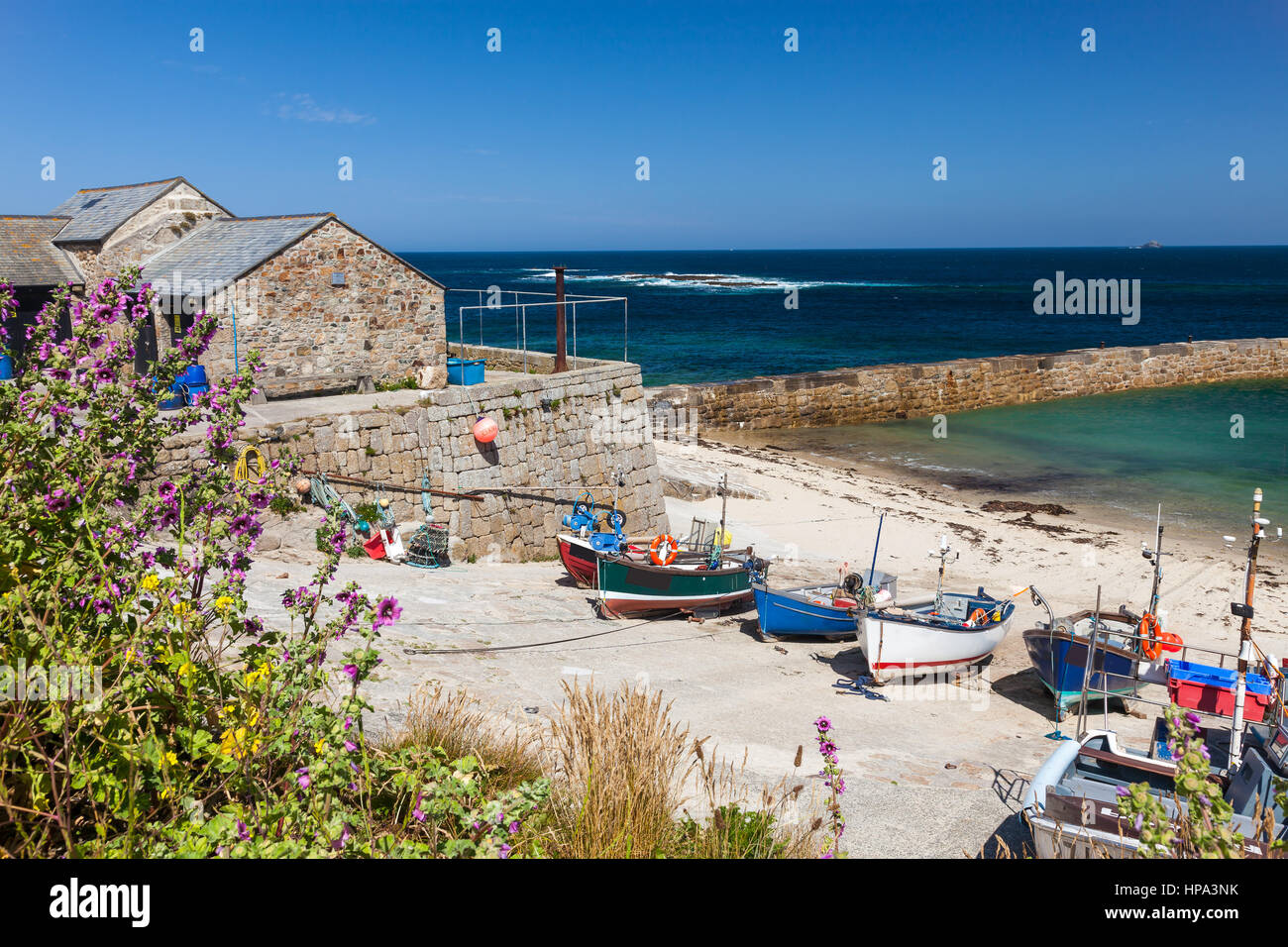 Small fishing boats in the harbour at Sennen Cove Cornwall England UK ...