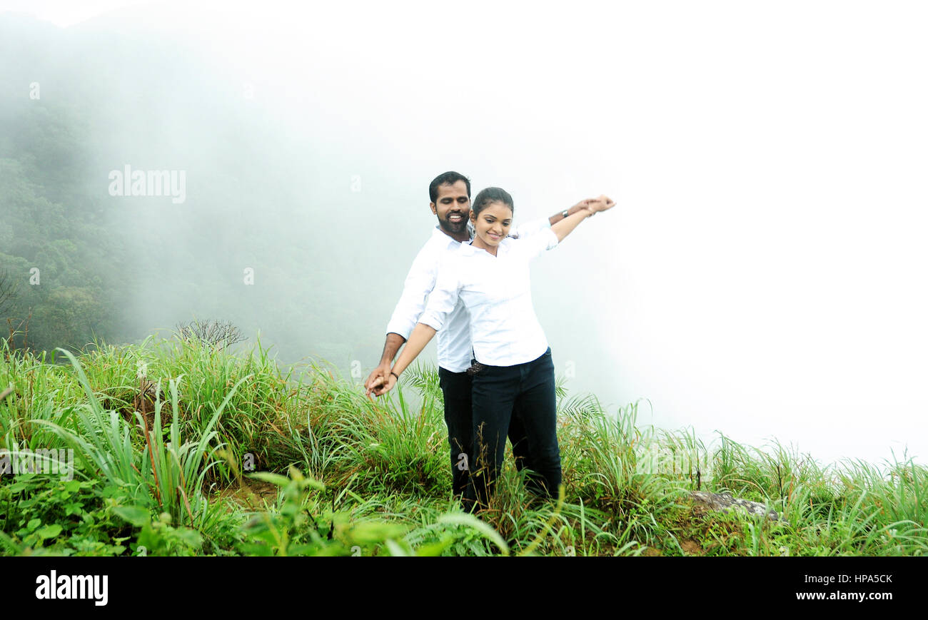 Hugging couple in high mountains, couple hugging in beautiful mountains ...