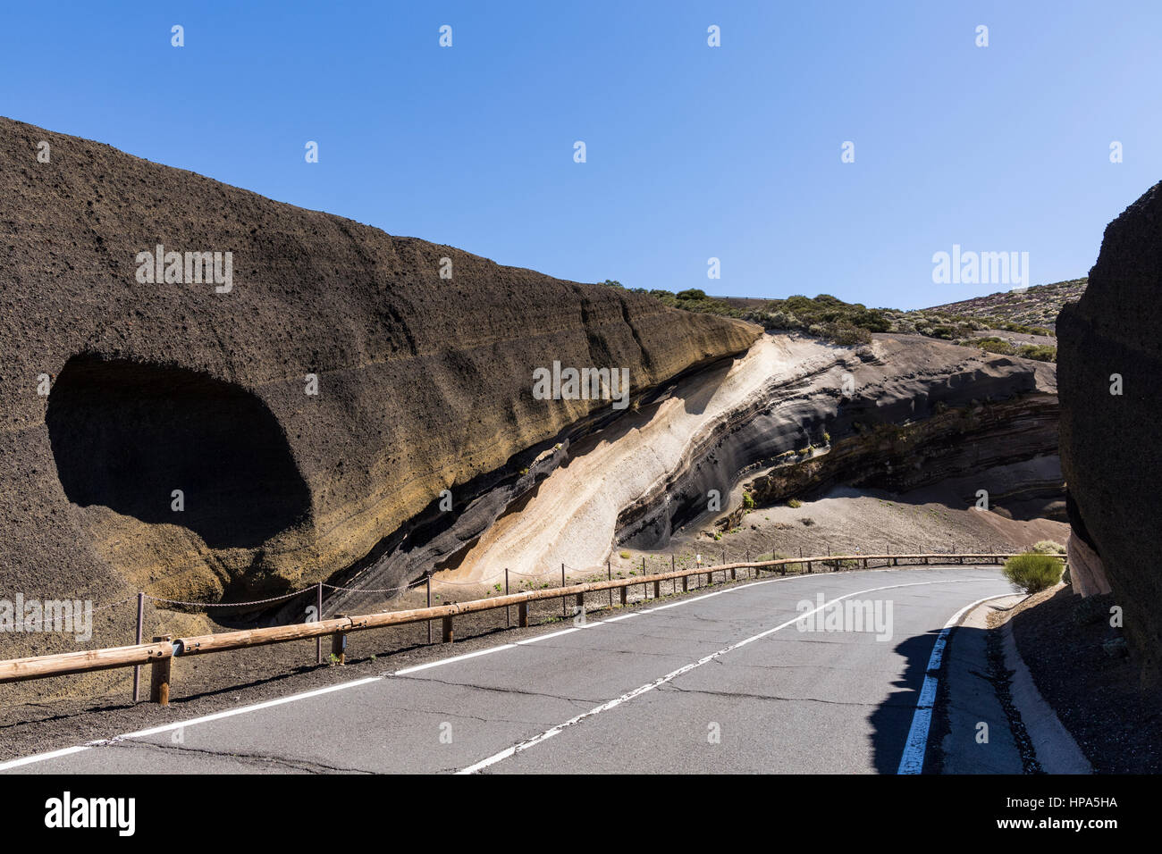 Volcanic rock strata on the side of the TF24 road in the National Park ...