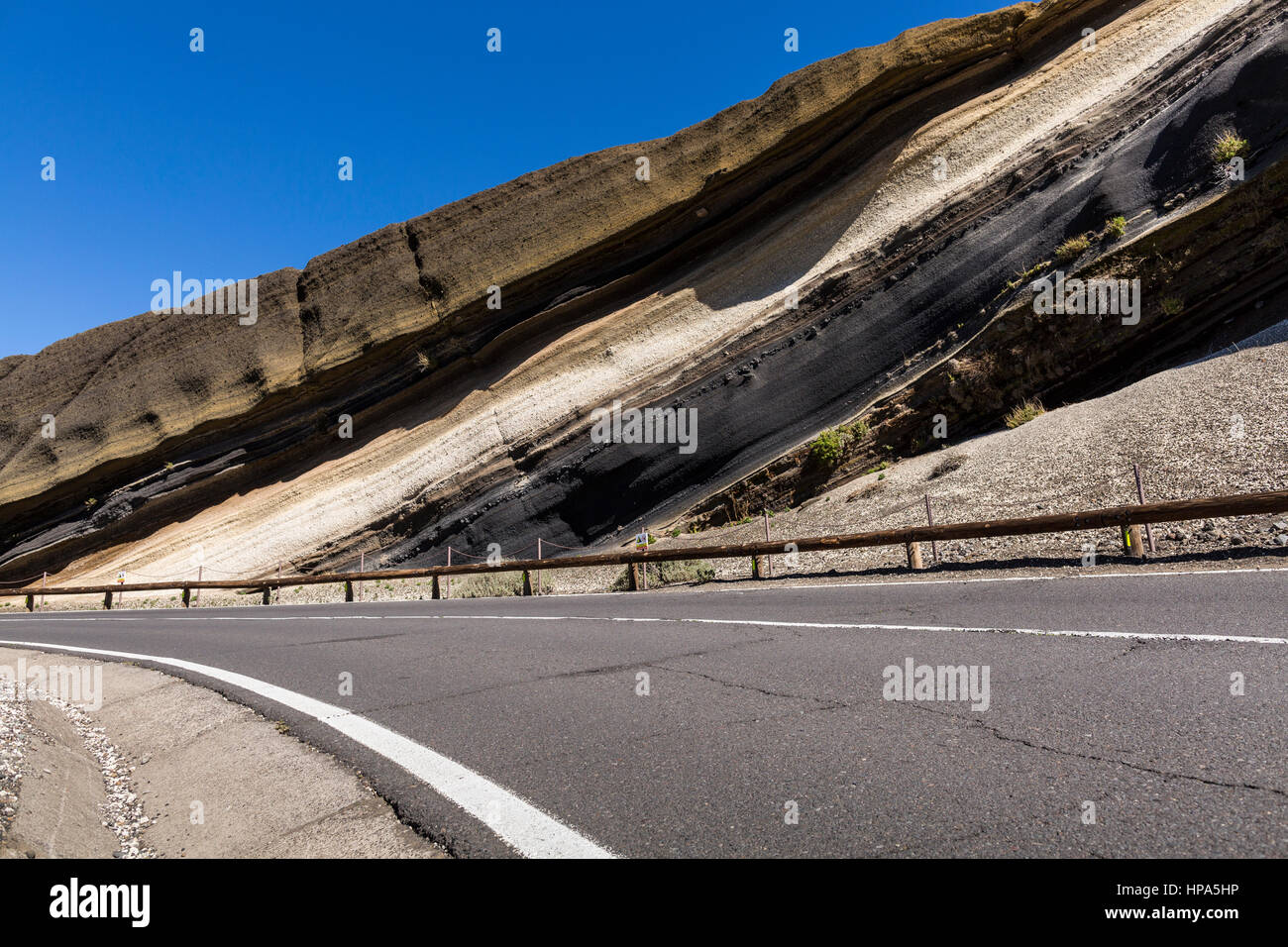 Volcanic rock strata on the side of the TF24 road in the National Park ...