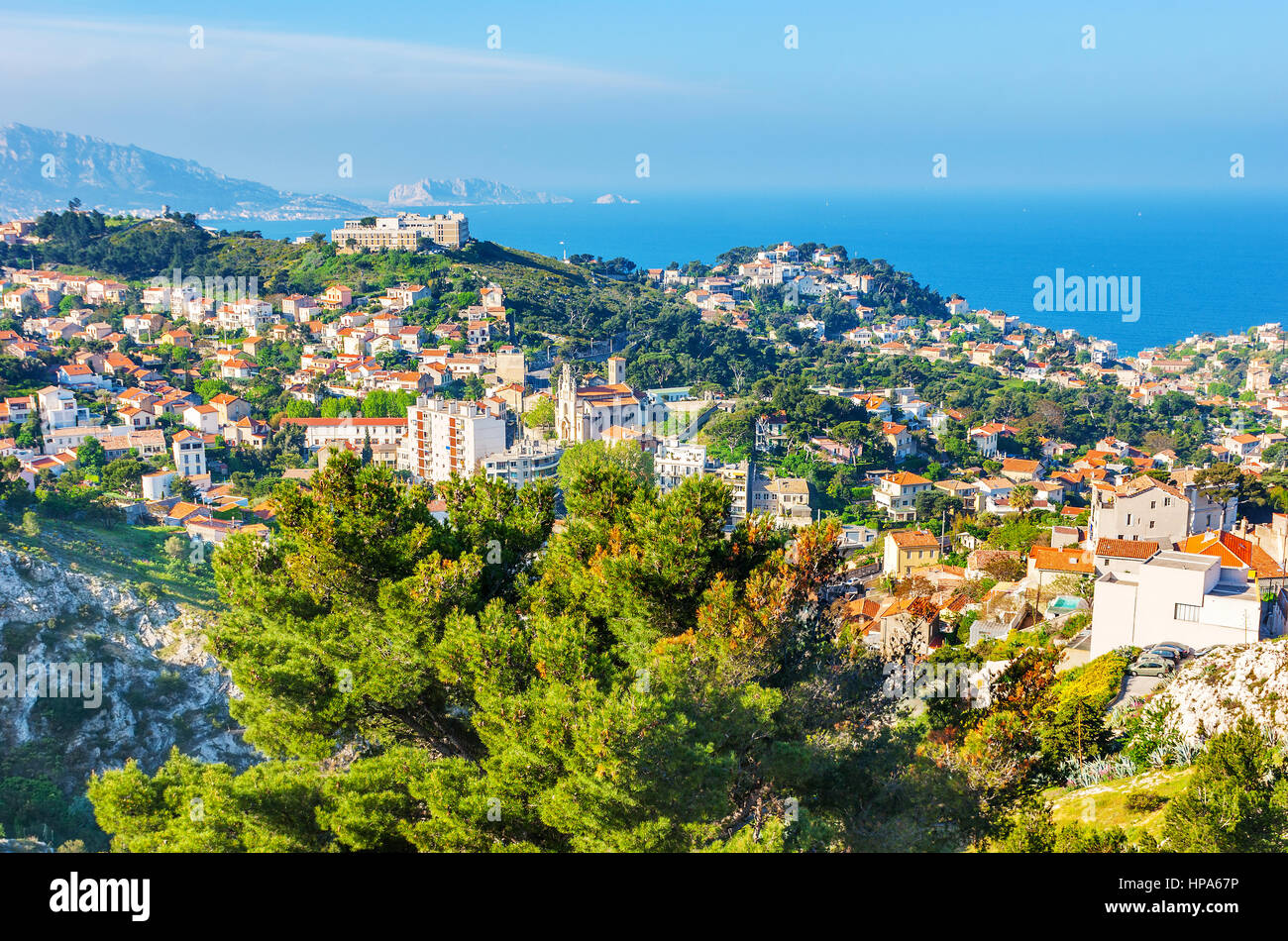 The buildings and villas of Marseille located among the rocky mountains ...