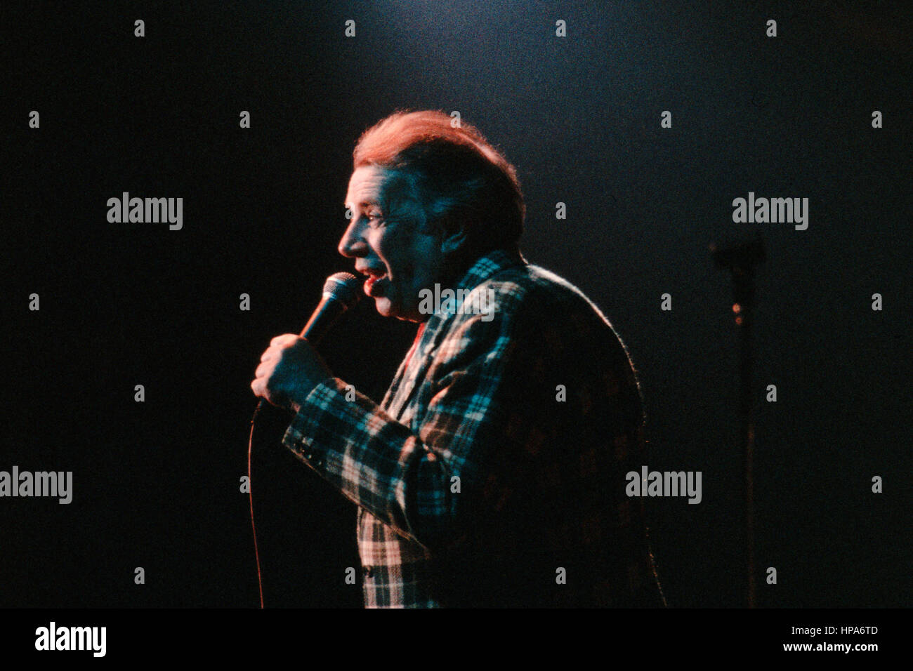 George Melly on stage 1987 Stock Photo - Alamy