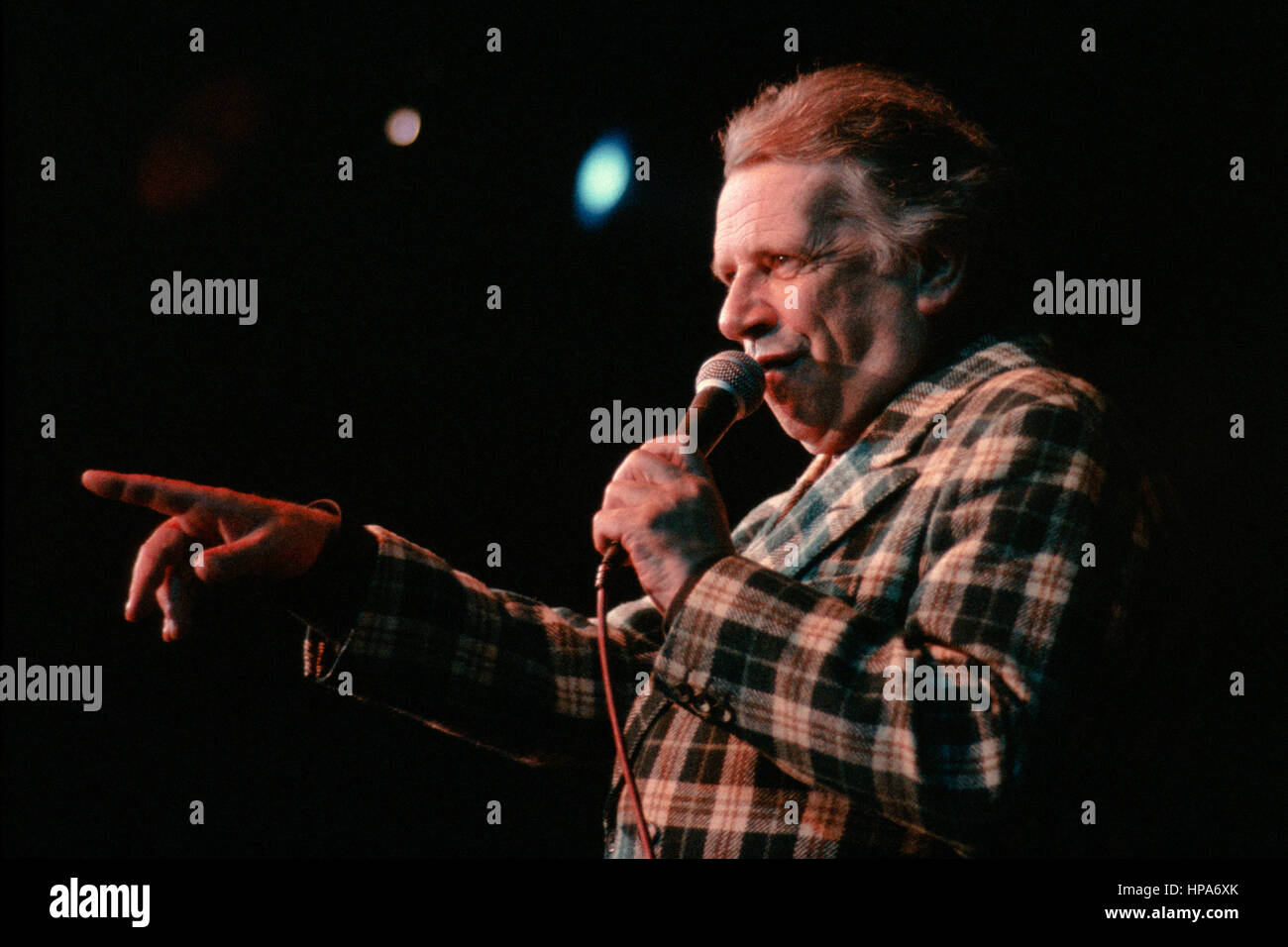 George Melly on stage 1987 Stock Photo - Alamy