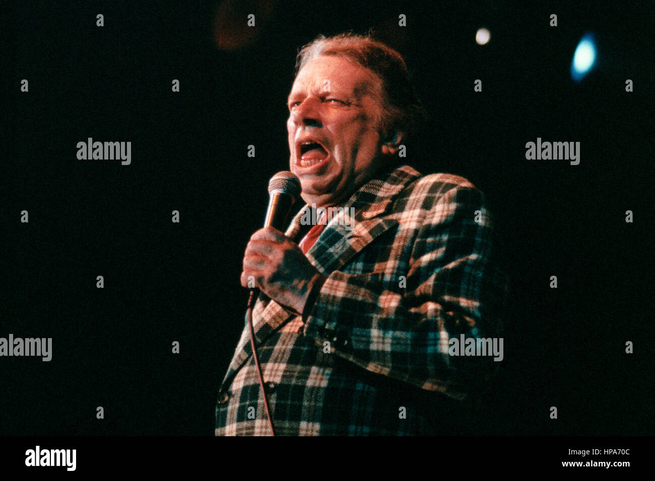 George Melly on stage 1987 Stock Photo - Alamy