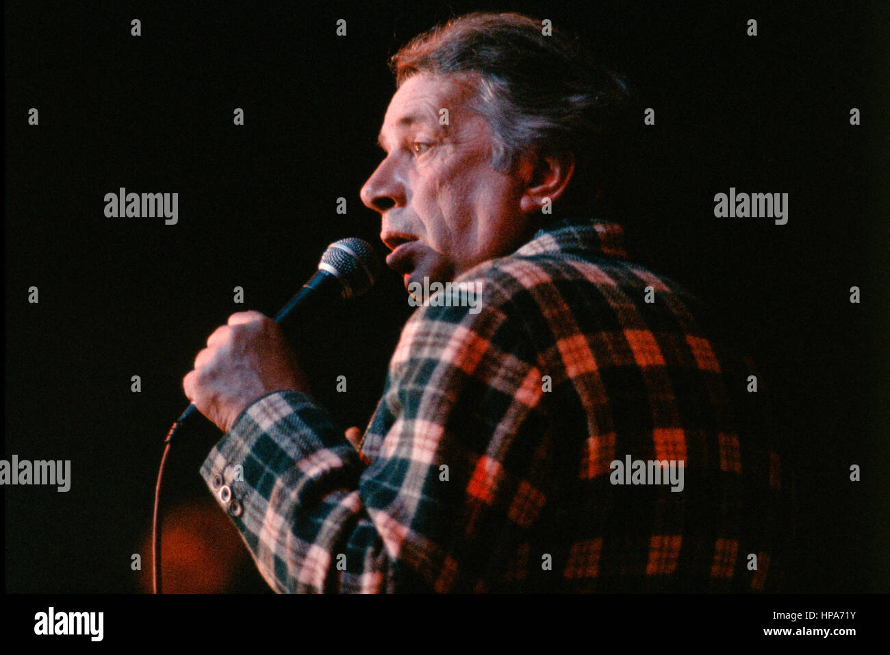 George Melly on stage 1987 Stock Photo - Alamy