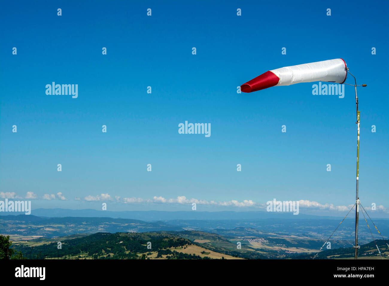 Windsock and blue sky Stock Photo - Alamy