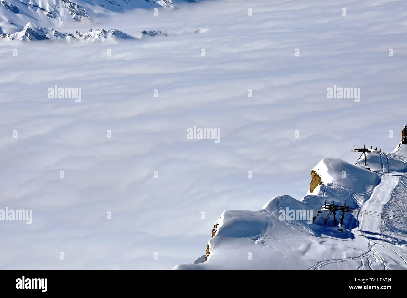 Ski resort in the Alps. Ski slopes, piste, powder snow in the mountains ...