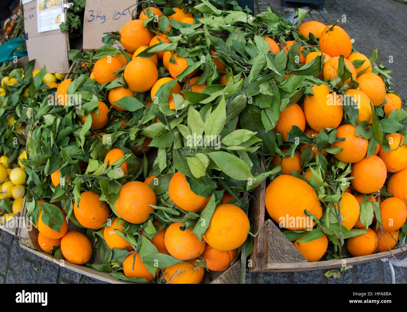 Fresh oranges for sale. Central market in old square, Honfleur ...