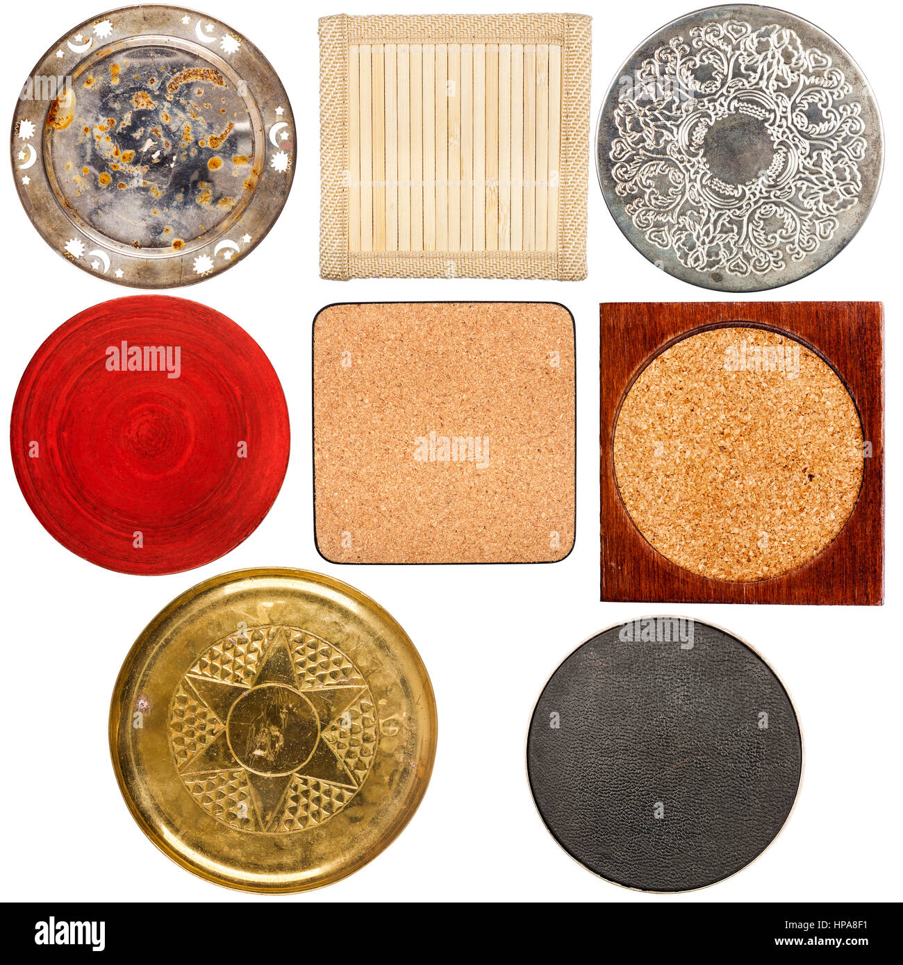 Collection of various vintage table coasters isolated on white ...