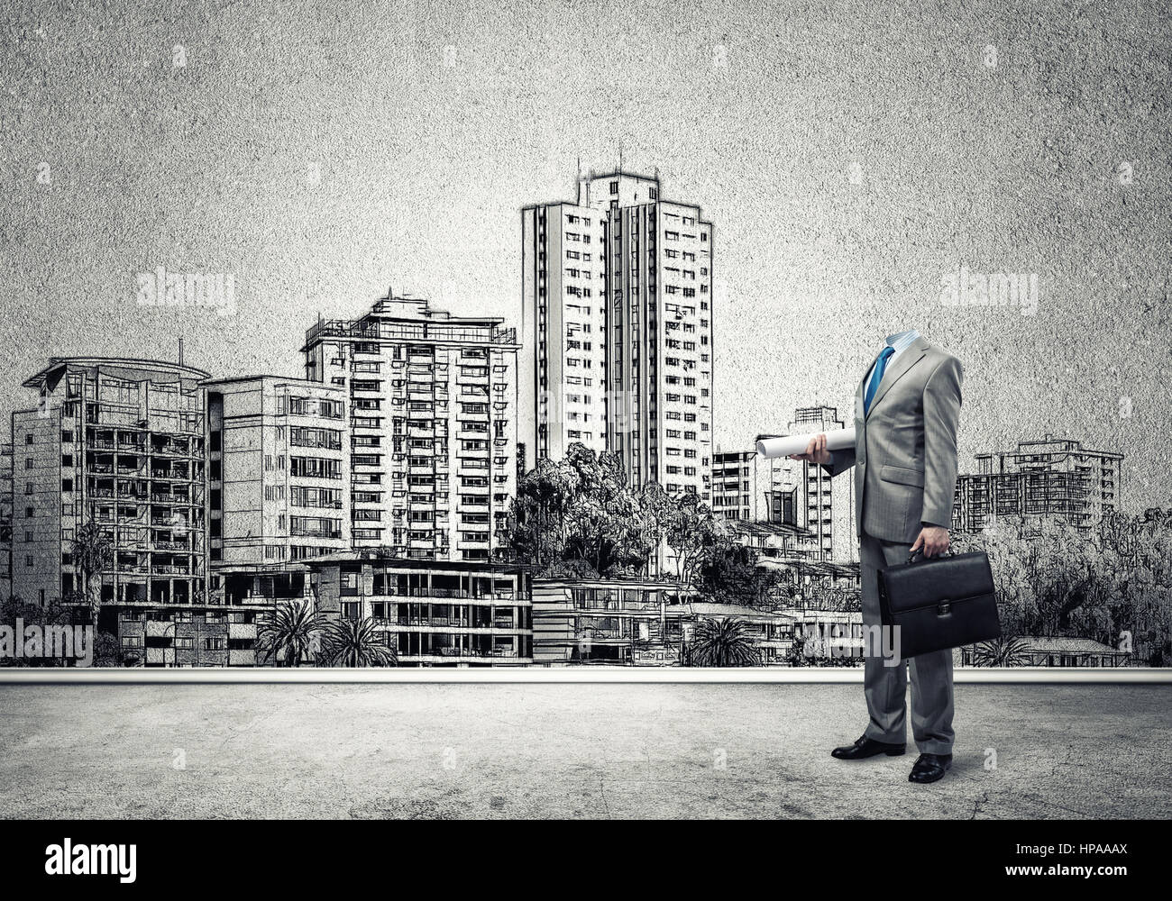 Headless engineer man with papers in hand against construction ...