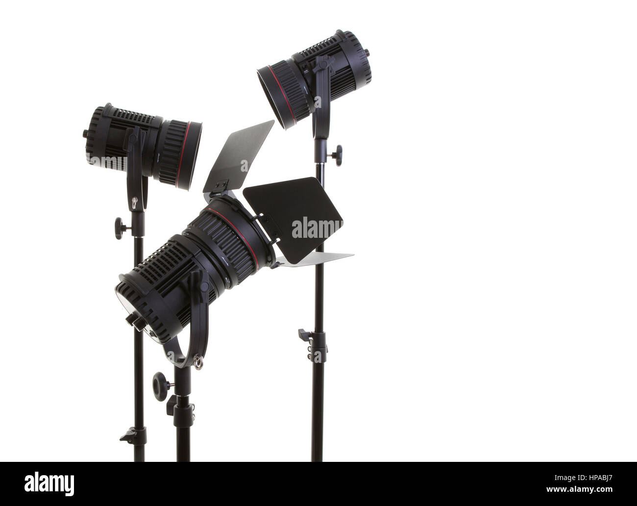Photographic studio lights on a white background Stock Photo - Alamy