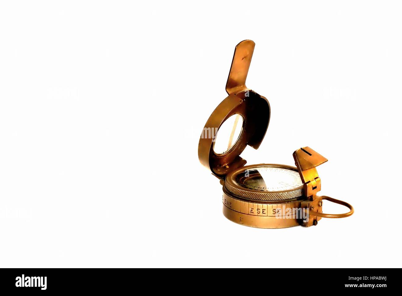 Old magnetic compass isolated on white background Stock Photo - Alamy