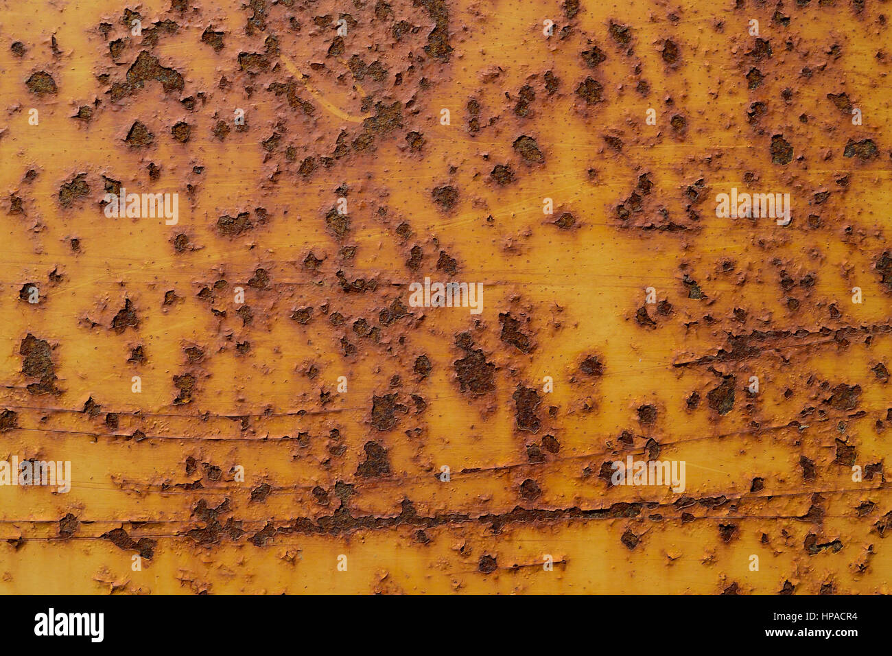 Rust Spots and Yellow Peeling Paint Stock Photo - Alamy