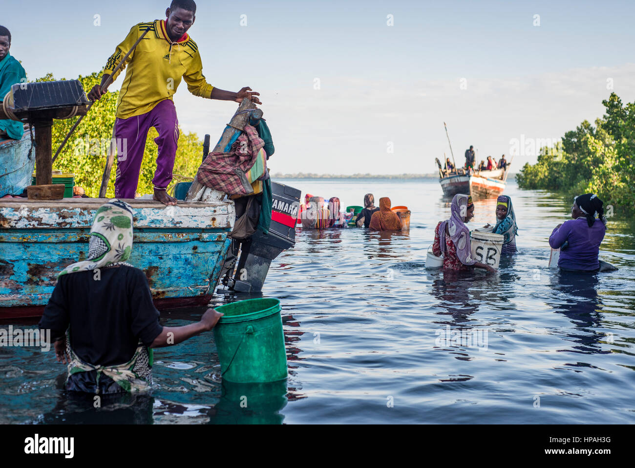 Fisherman walk in water High Resolution Stock Photography and Images ...
