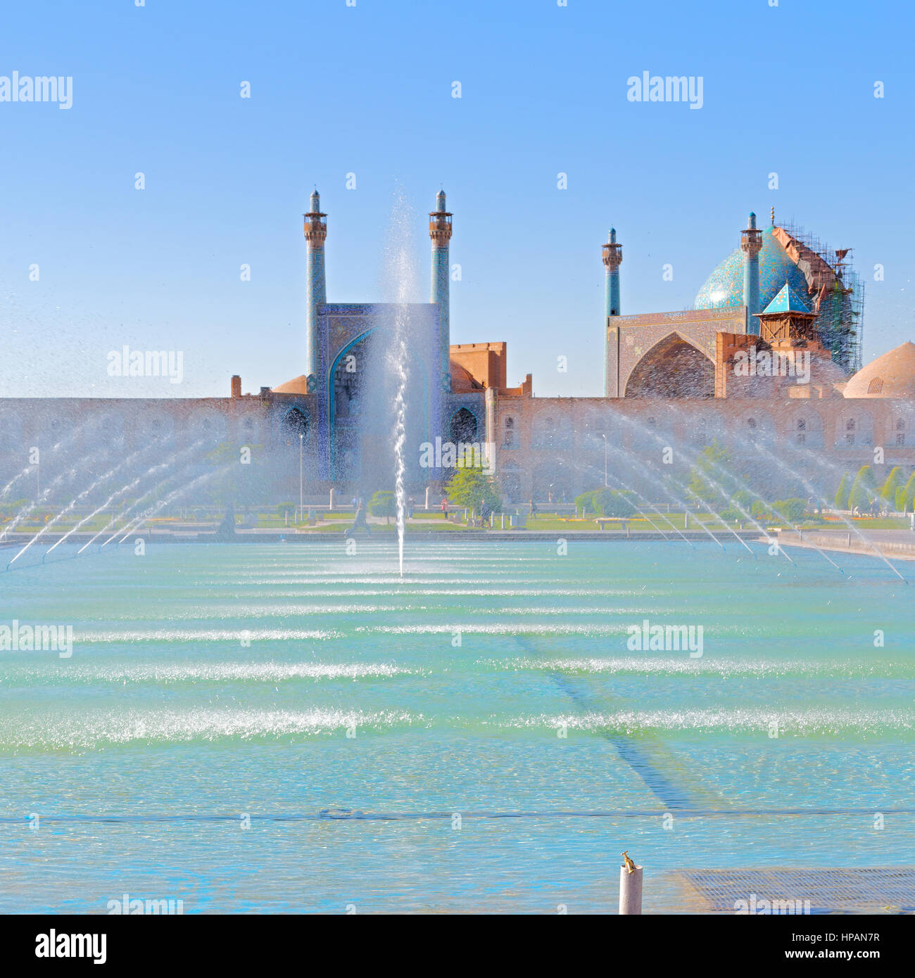 in iran old square mosque and fountain water backlight Stock Photo - Alamy