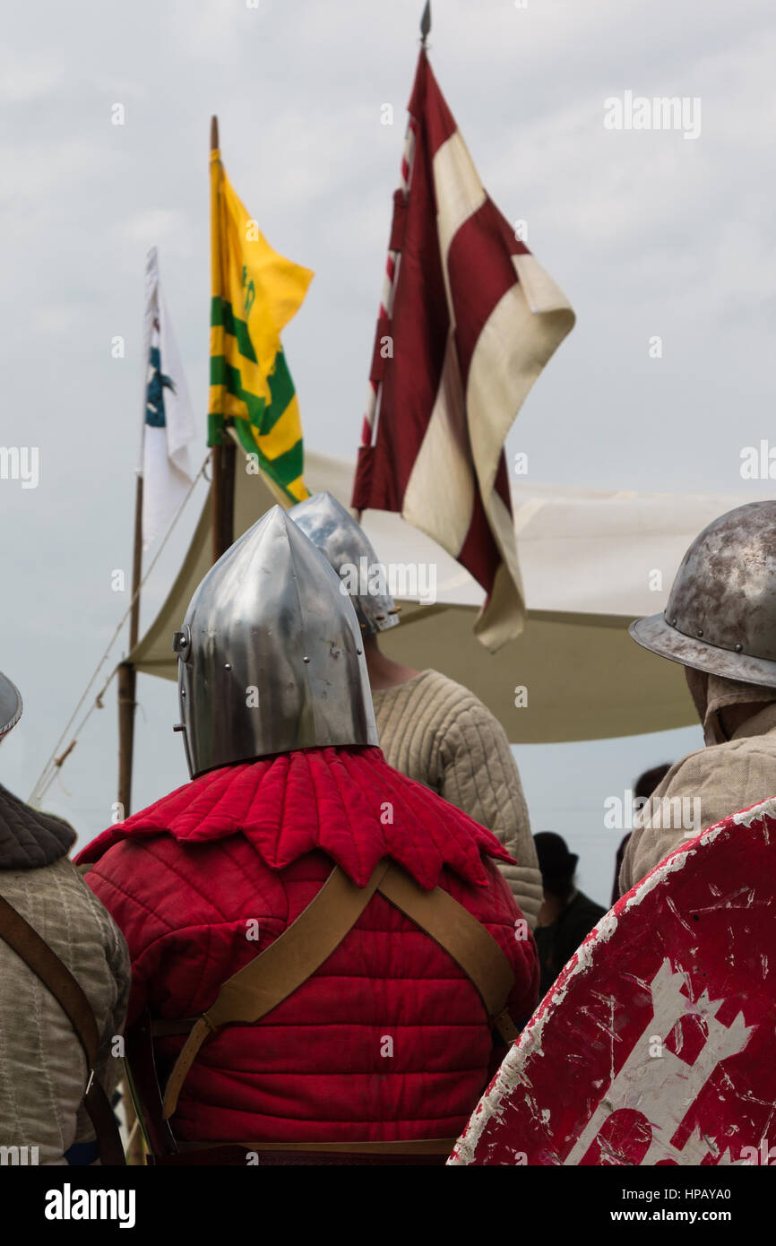 Knights with Silver Helmets and Shields seated on Chair: Medieval Event ...