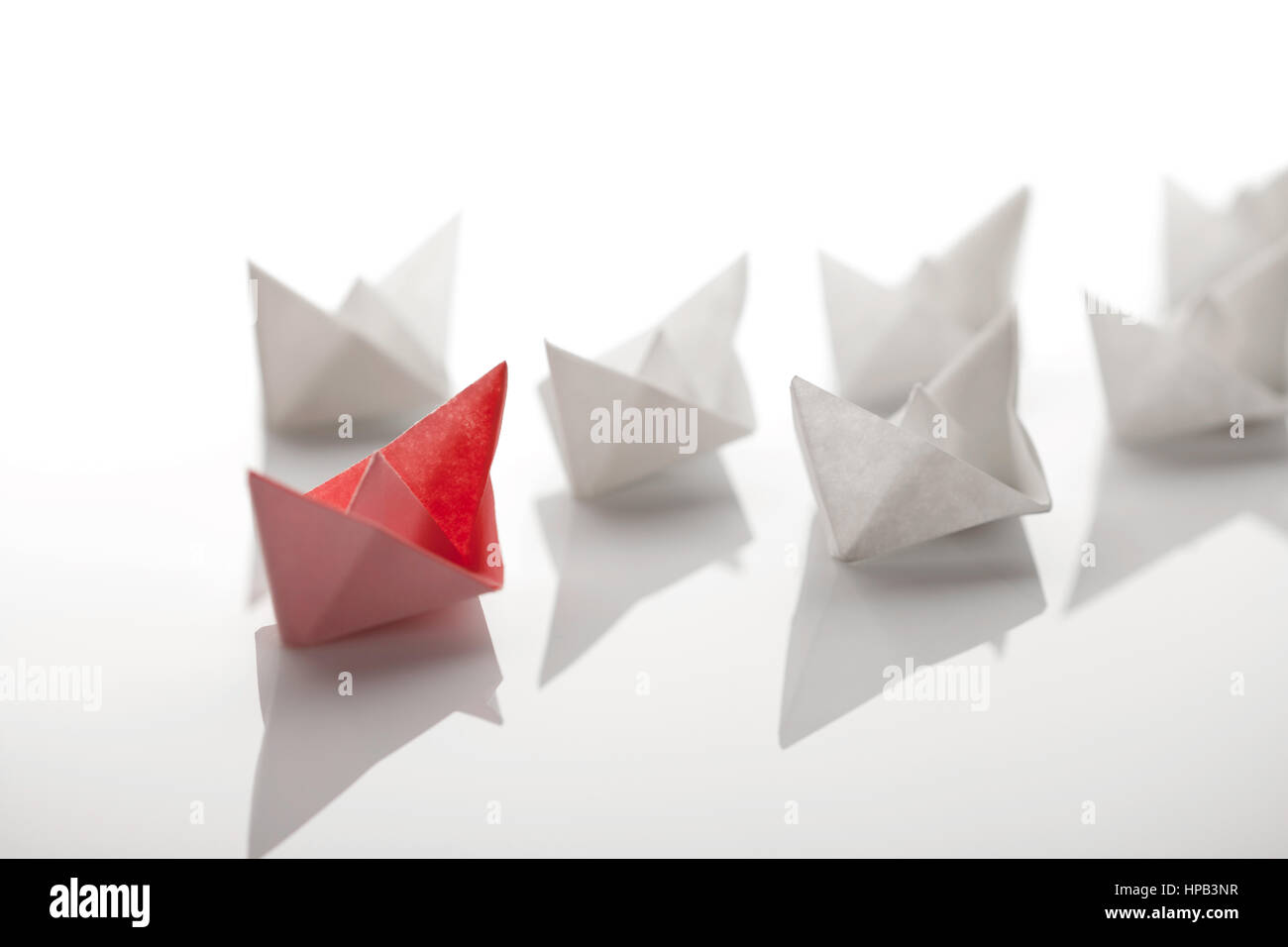 Origami paper ship on white background with Clipping Path Stock Photo ...