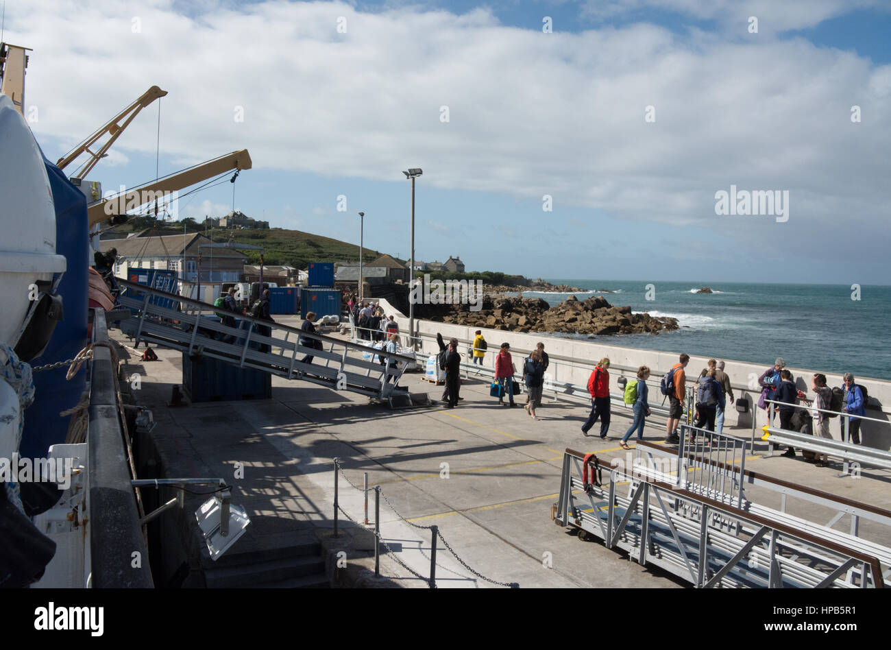 passengers disembark from the Isles of Scilly ferry at Hugh Town, St ...