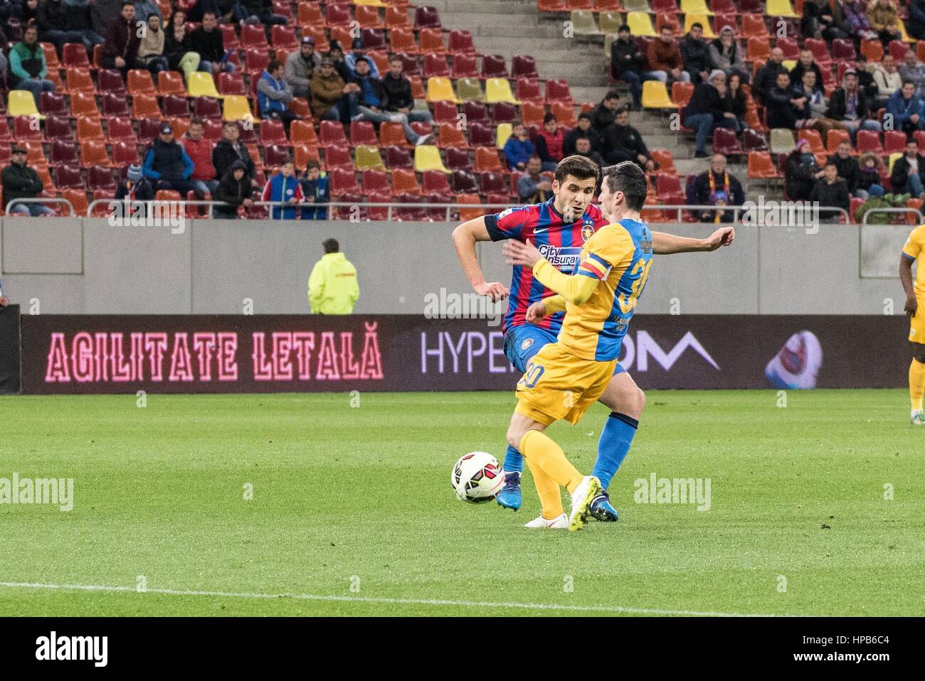 April 9, 2015: Lucian Filip #8 of FCSB L and Laurentiu Marinescu #30 of ...