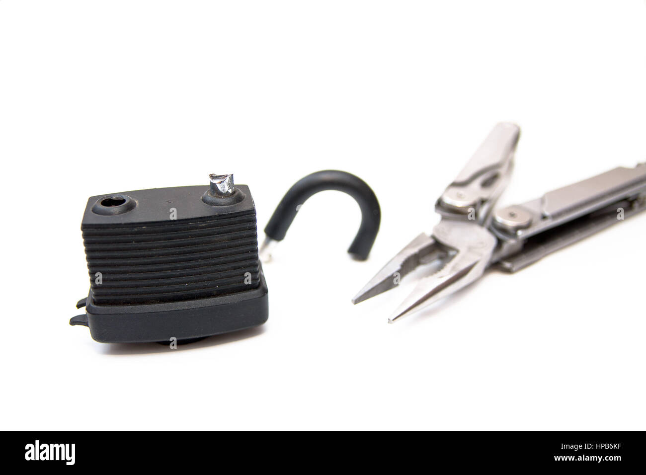 Broken lock on a white background. Lock broken cutters Stock Photo - Alamy