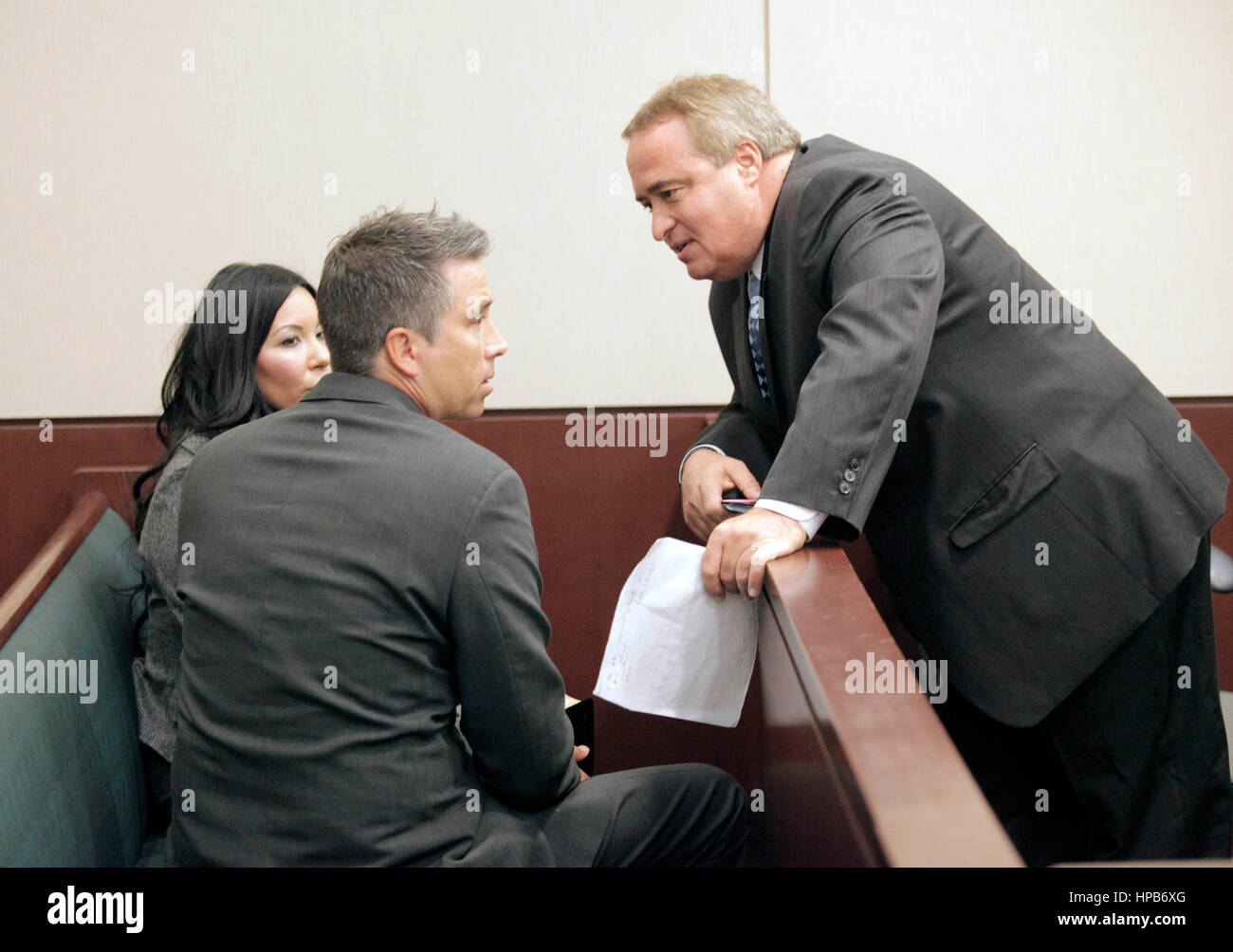 Richard Acosta ,center, and his wife, Monique, left, talk to their ...