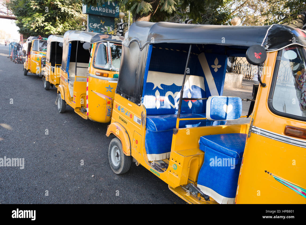 Yellow auto rickshaws hi-res stock photography and images - Alamy