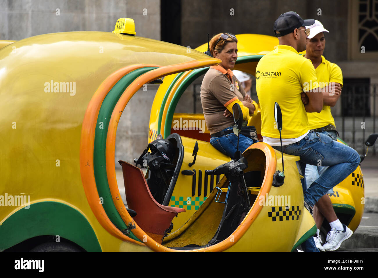 Coco Taxis Havana Vieja Stock Photo - Alamy