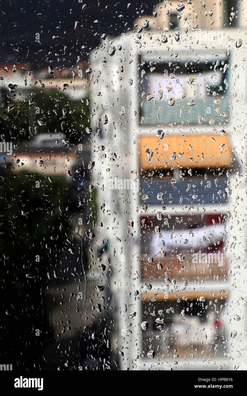 Crowd of clear rain drops on the window glass surface Stock Photo - Alamy