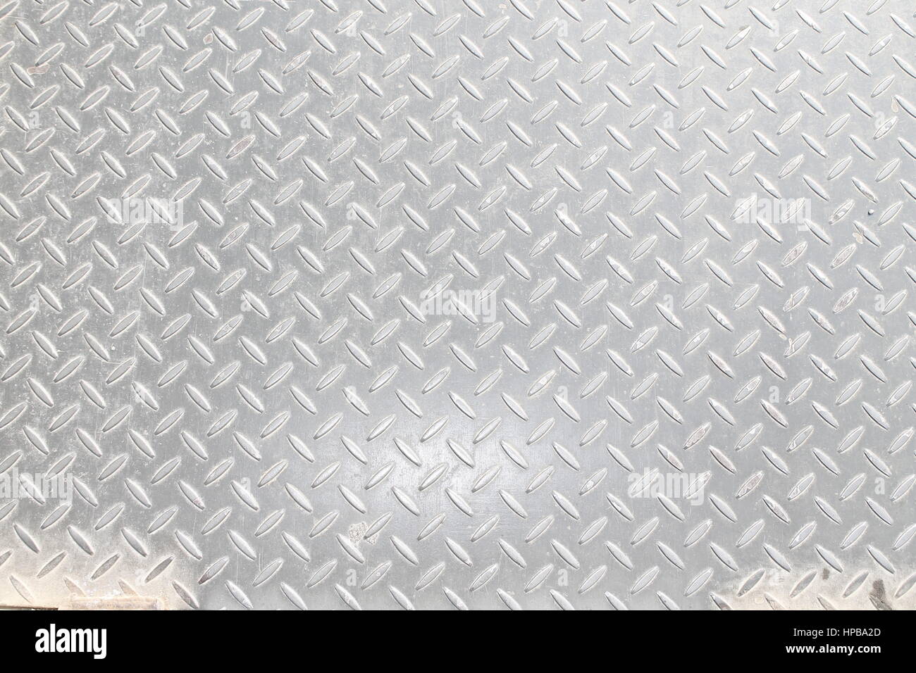 a metal background or texture with tread plate pattern Stock Photo - Alamy
