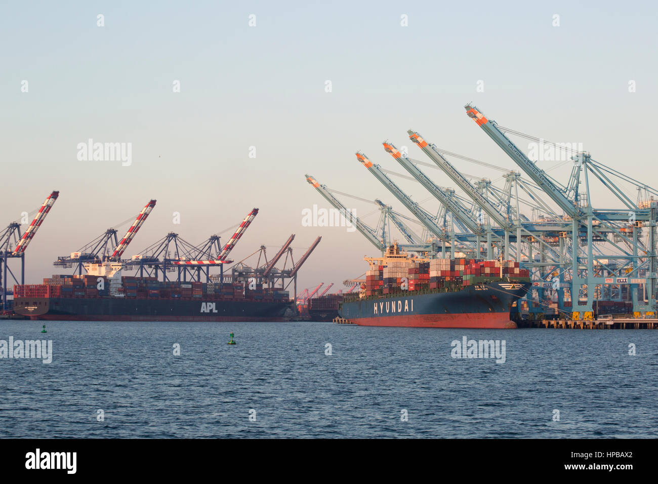 Dockside cranes unloading ship hi-res stock photography and images - Alamy