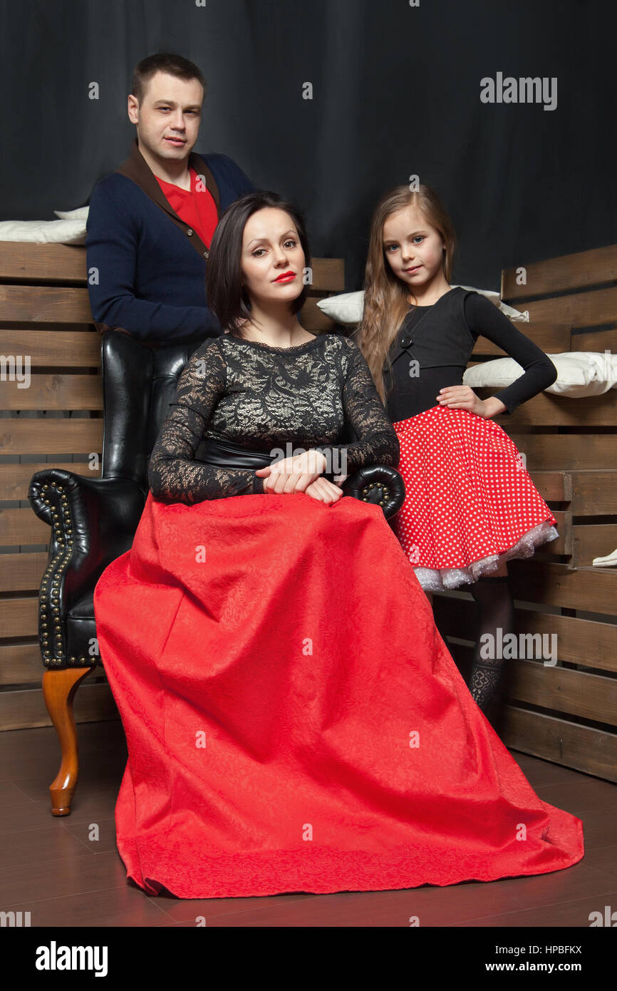 Portrait of young family wearing elegant Stock Photo - Alamy