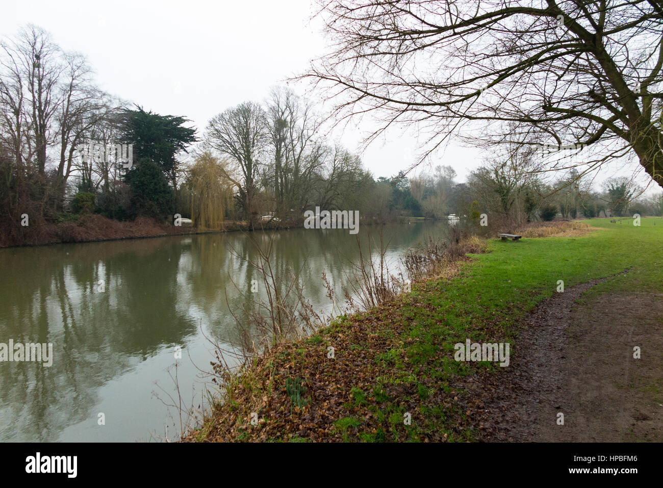The River Thames and Runnymede meadow / flood plain on a cold damp grey ...