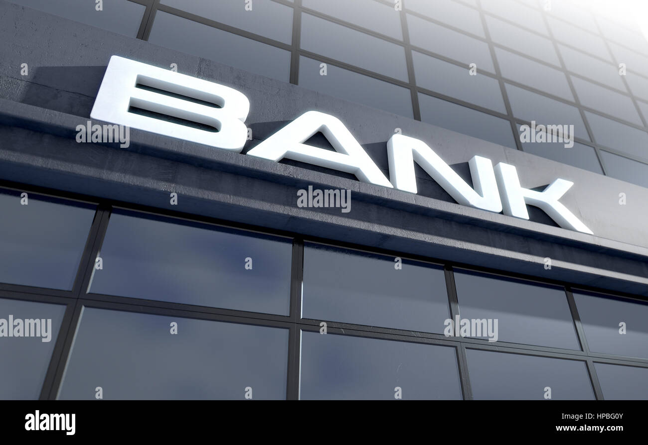 Banking light box signage above the entrance to a modern glass bank ...