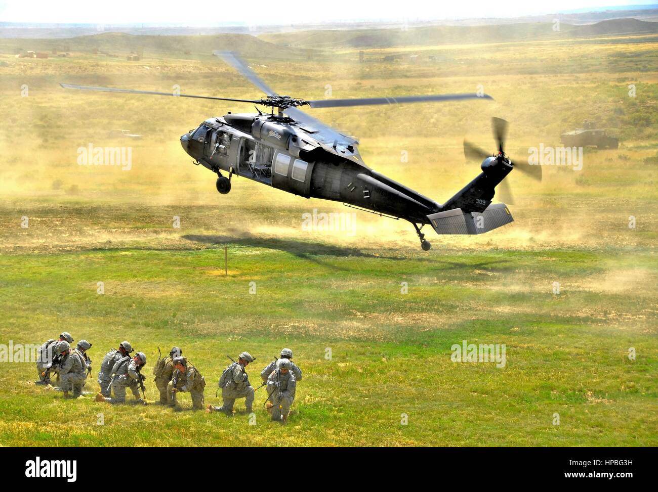 Helicopter picking up Soldiers Stock Photo - Alamy