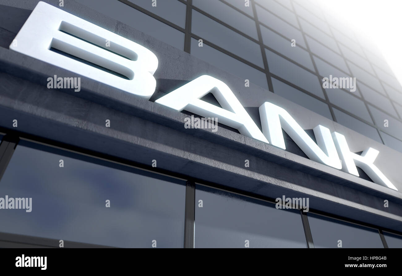 Banking light box signage above the entrance to a modern glass bank ...