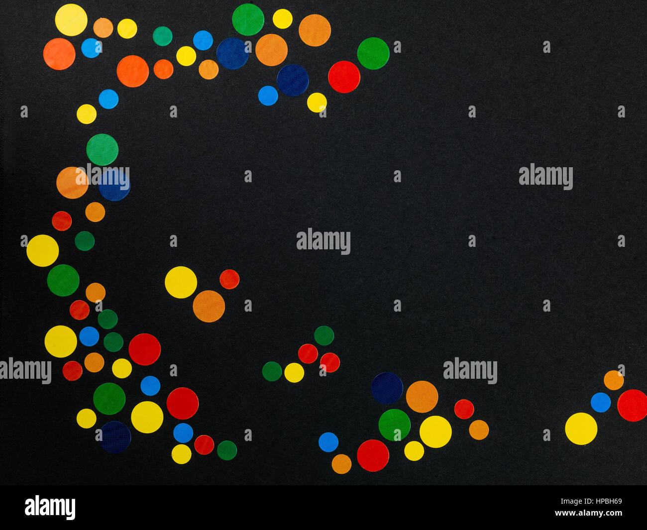 Colored Dots Creating a Pattern on a Black Background Stock Photo - Alamy