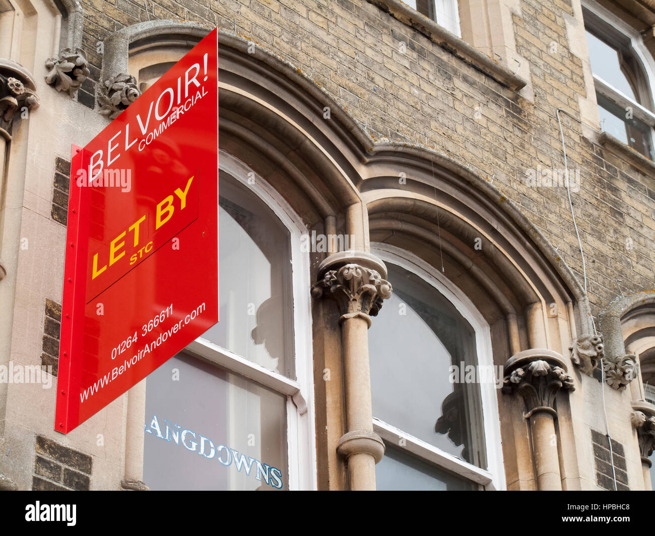 Commercial vacant offices to let sign over retail premises Stock Photo ...