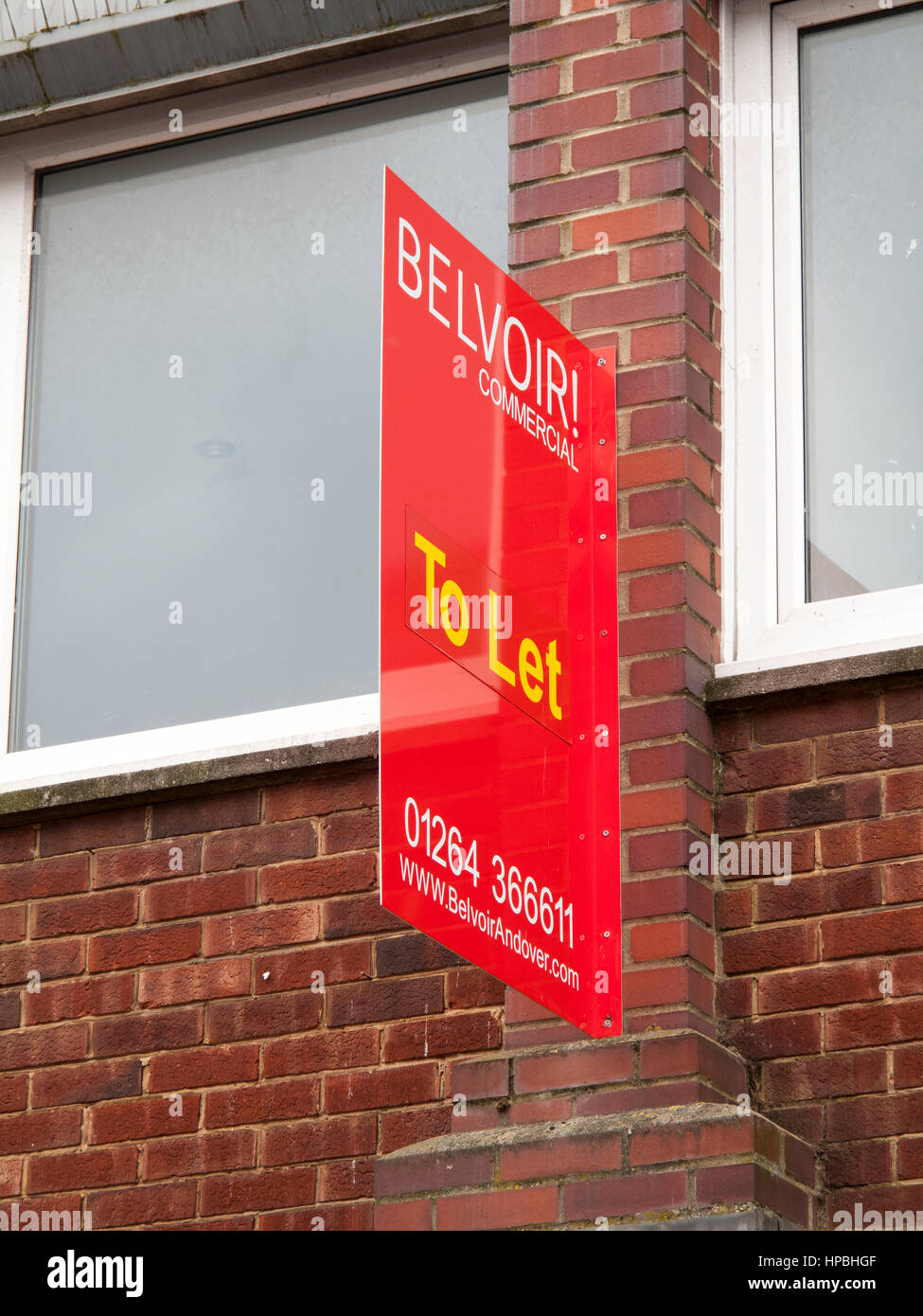 Commercial vacant offices to let sign over retail premises Stock Photo ...