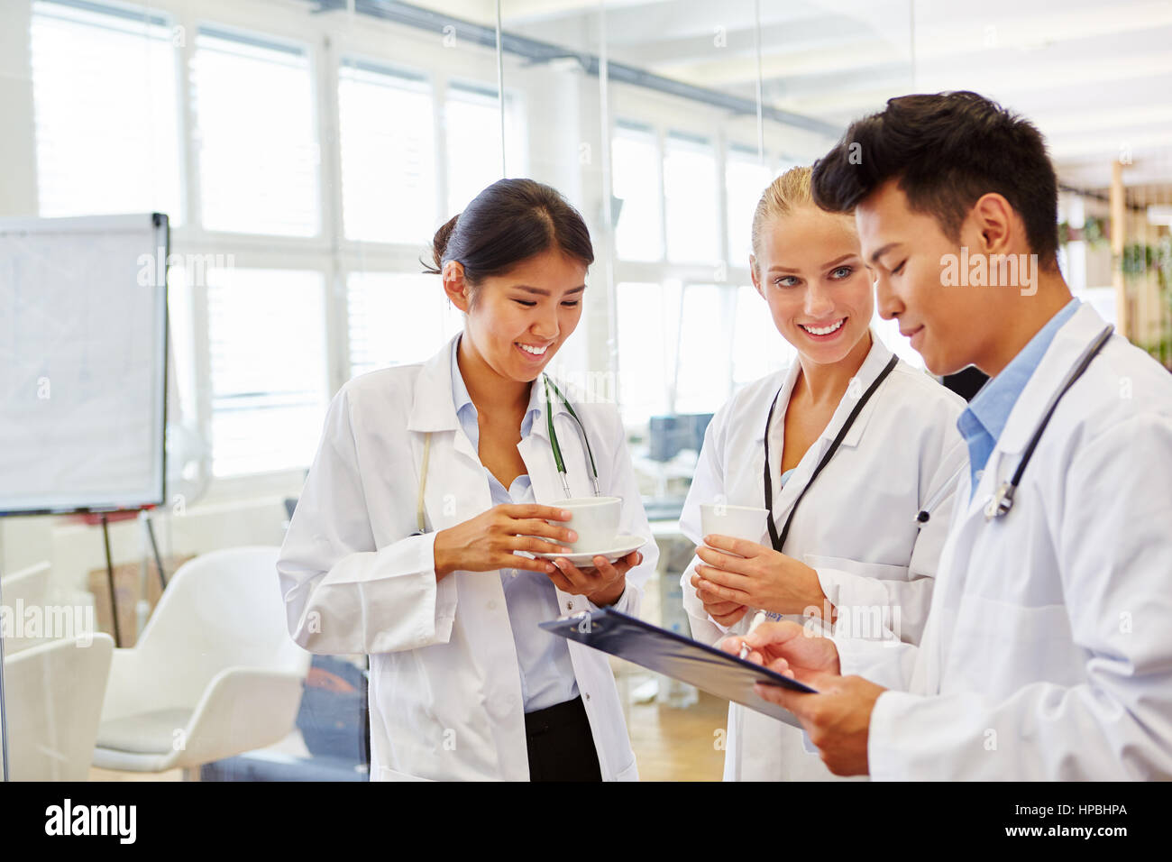 Medical school students discussing therapy and learn together at ...