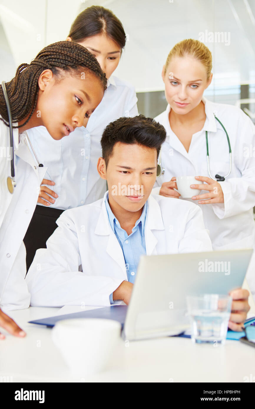 Doctors nurse working computer in hi-res stock photography and images ...