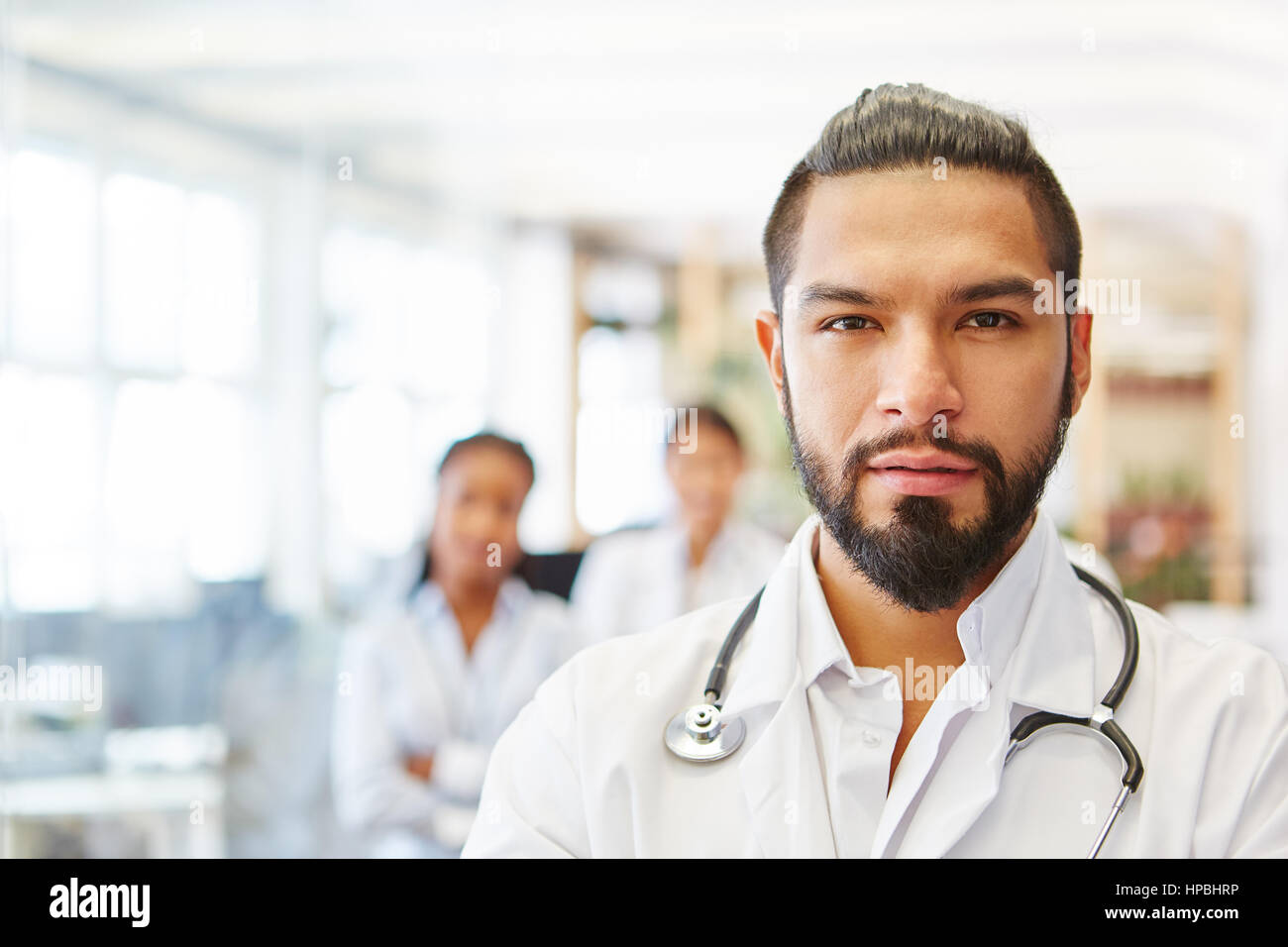 Competent doctor as chief physician showing competence and leadership ...