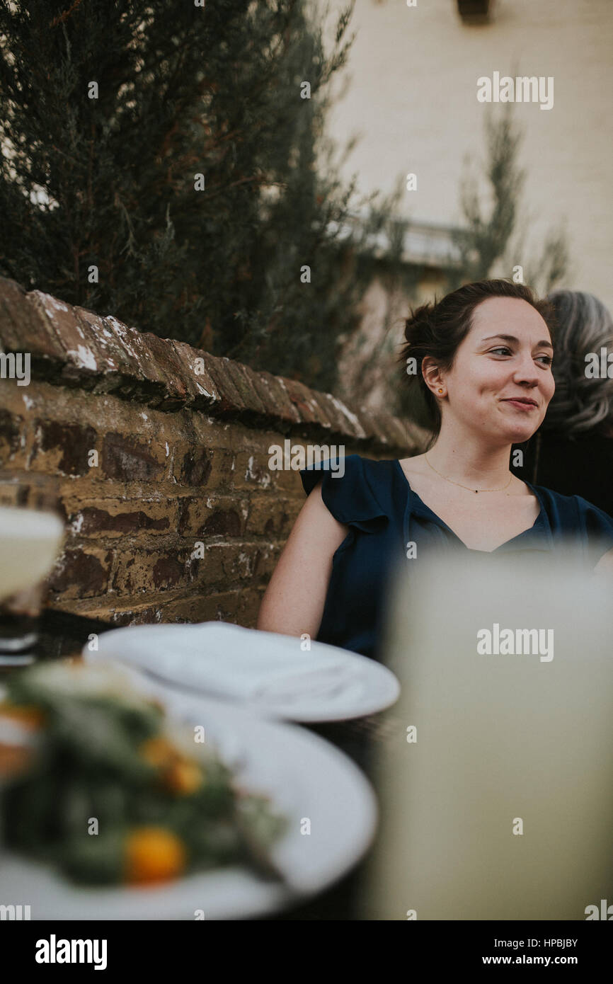 Women sitting outside eating food hi-res stock photography and images ...
