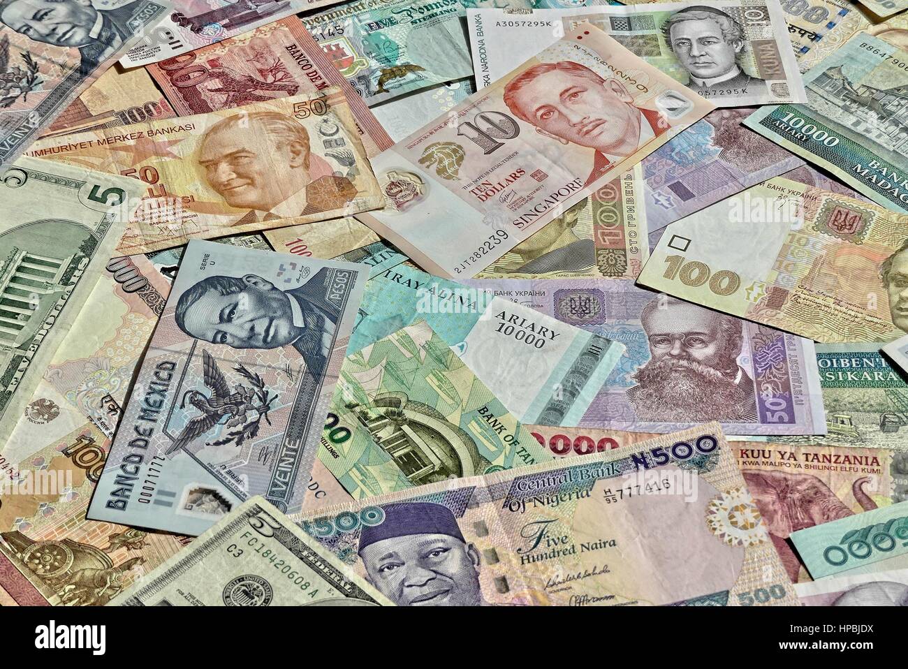 Mixed world currencies and bank notes Stock Photo - Alamy