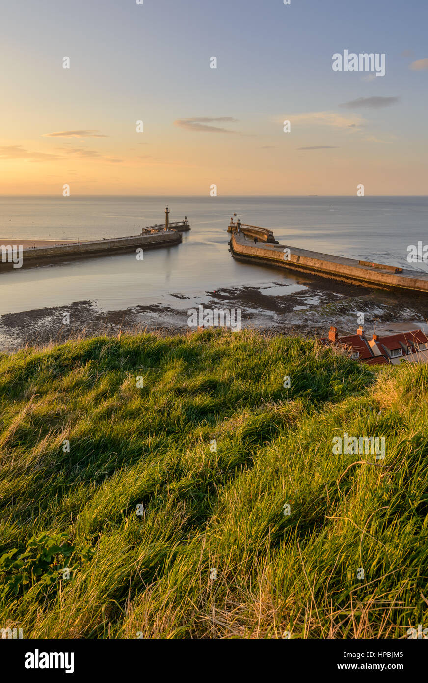 Whitby harbour viewed from the East Cliff at sunset Stock Photo - Alamy