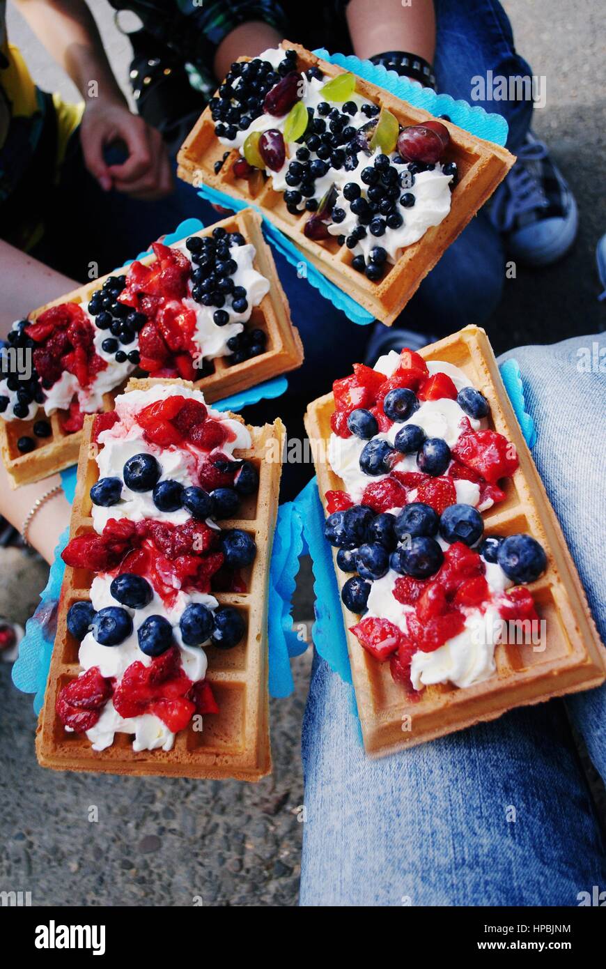 Delicious waffles with friends Stock Photo - Alamy