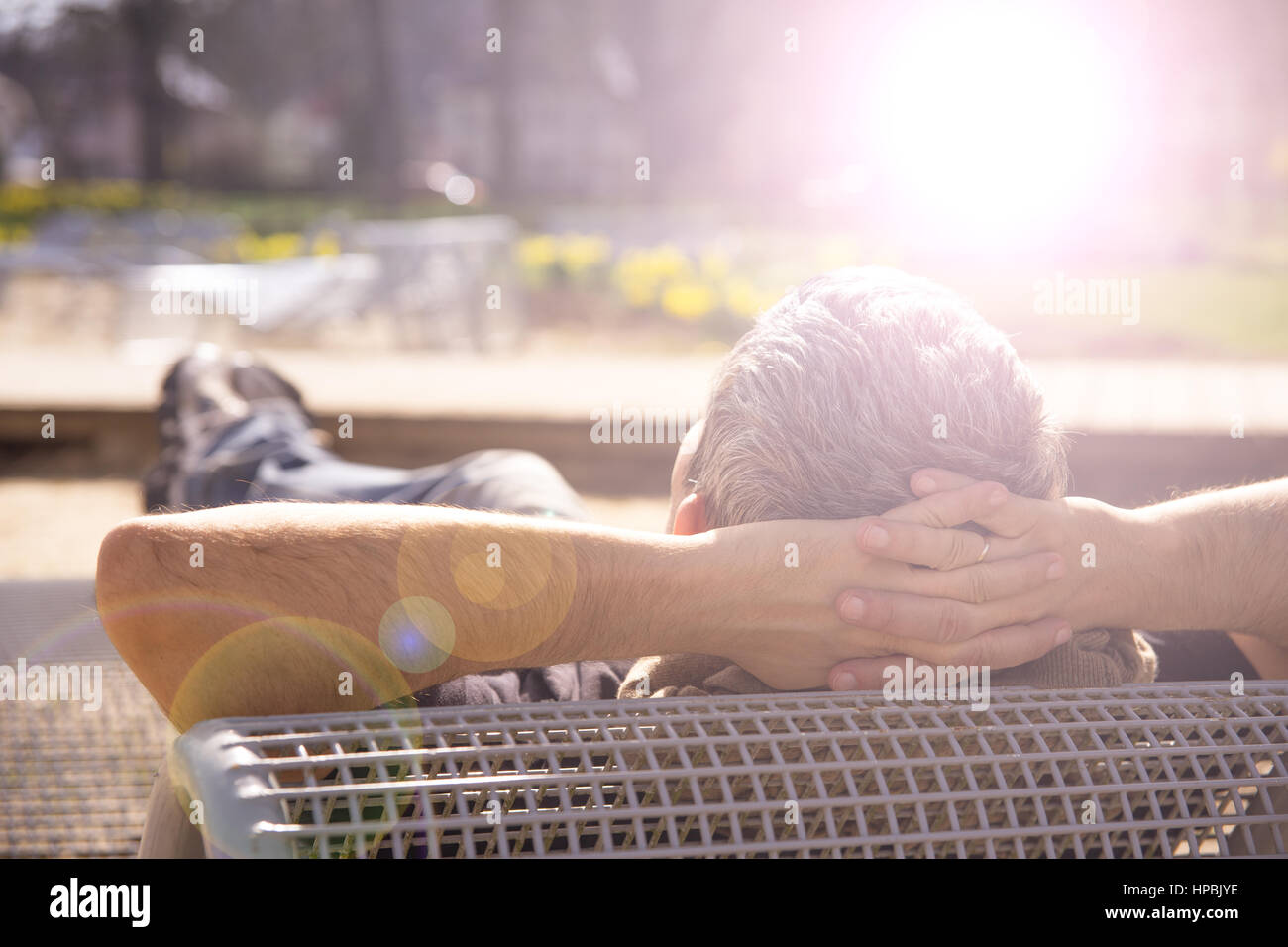Male model posing on bench hi-res stock photography and images - Alamy
