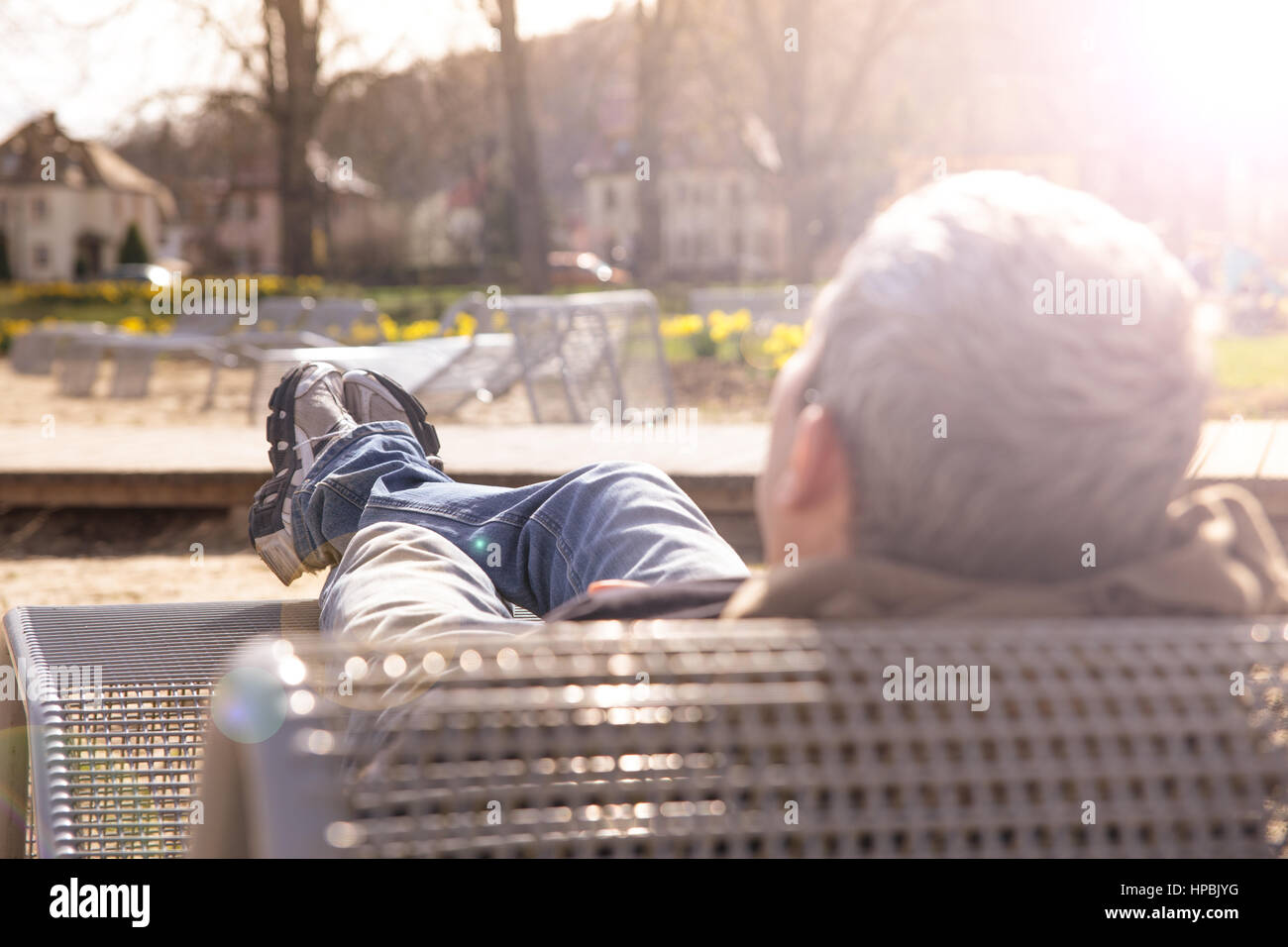 Male model posing on bench hi-res stock photography and images - Alamy